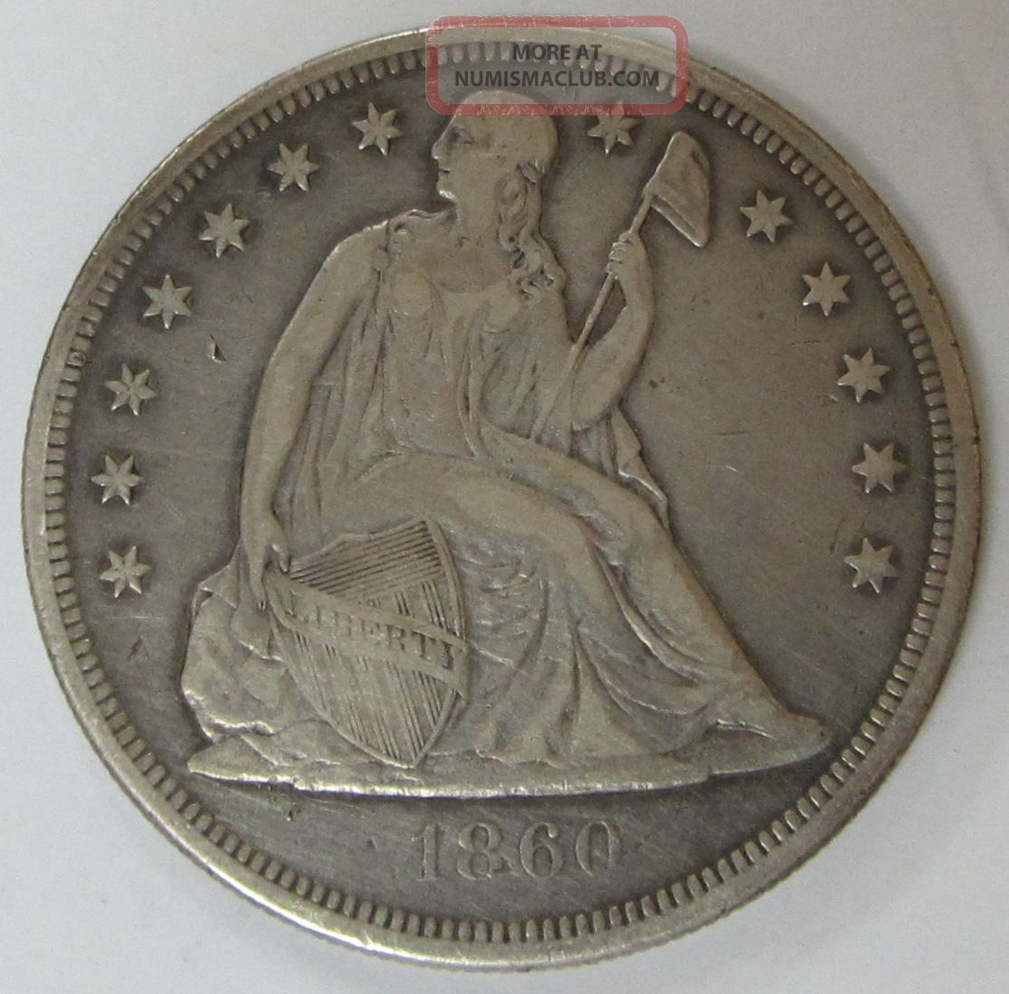 1860 O Us Seated Liberty Silver Dollar With