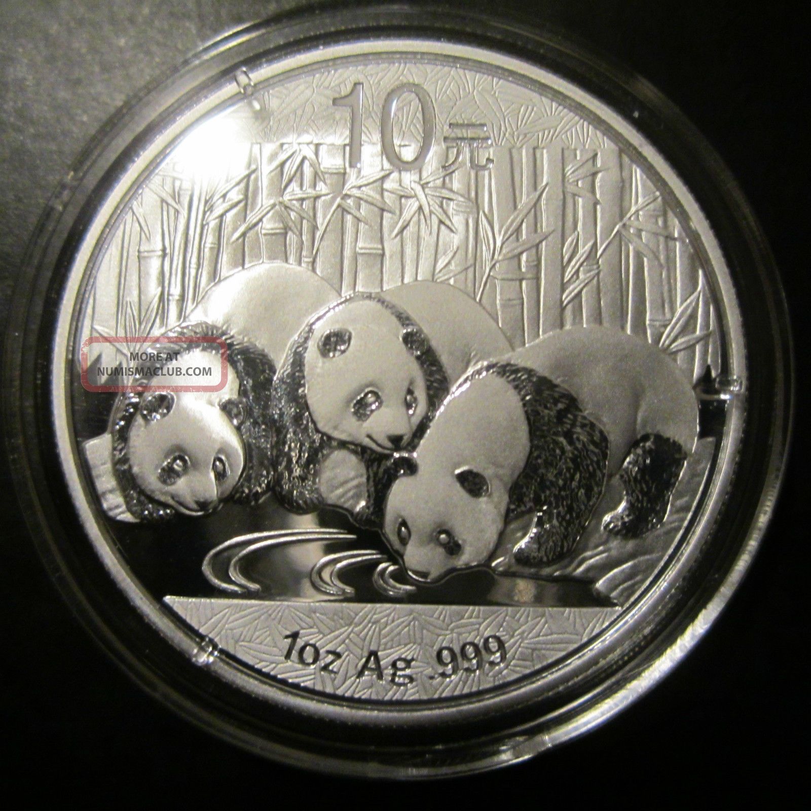 2013 Chinese Panda 1 Oz Pure. 999 Silver Coin