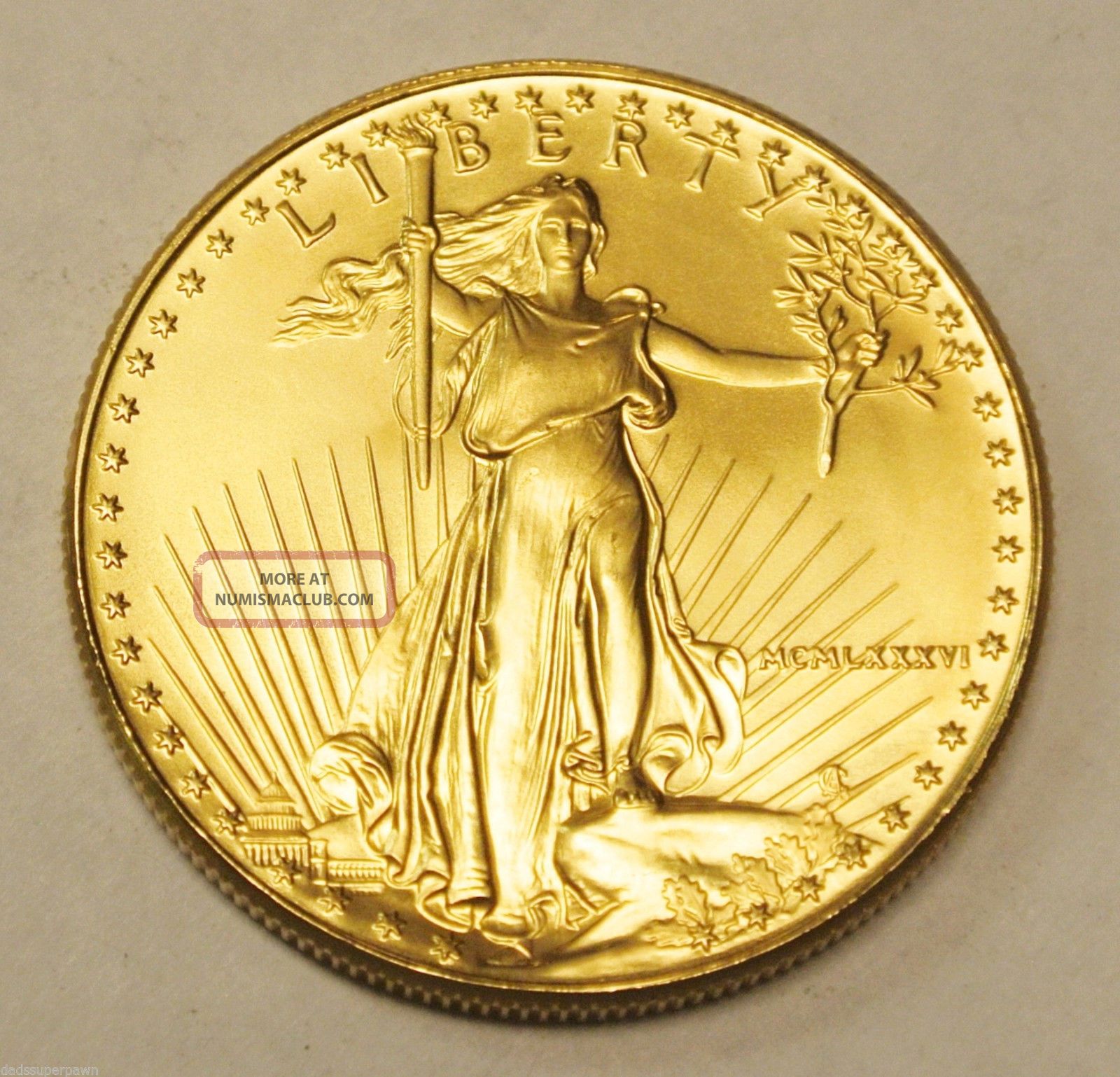 (1) 1986 $50 1oz. 999 Gold American Eagle Coin - First Year