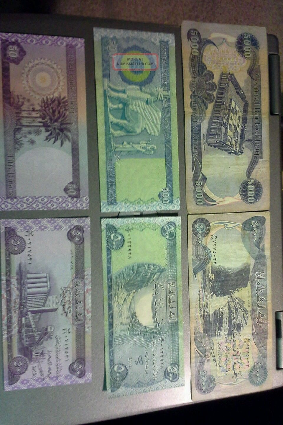 Iraqi Dinar: 2 X 5000, 2 X 500, 2 X 50 = 11, 100